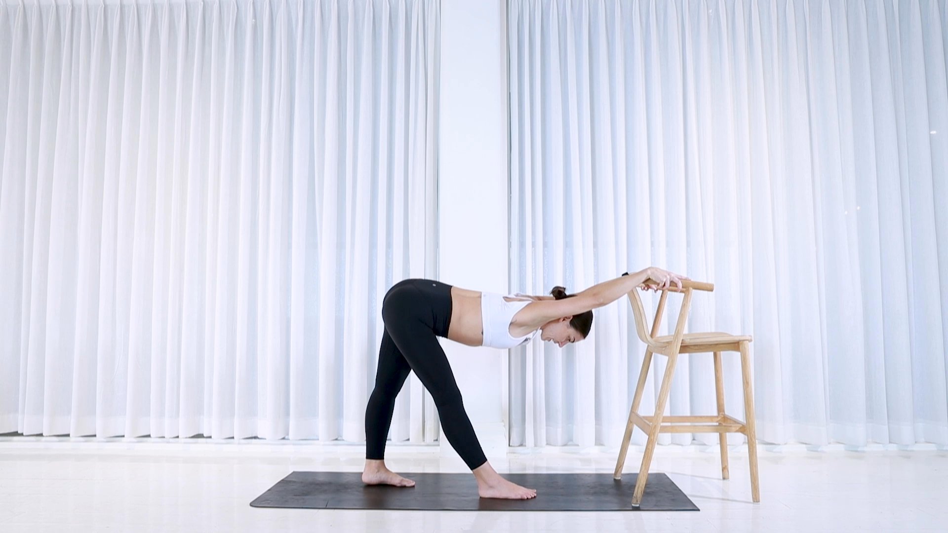 Standing Stretch - The Pilates Class